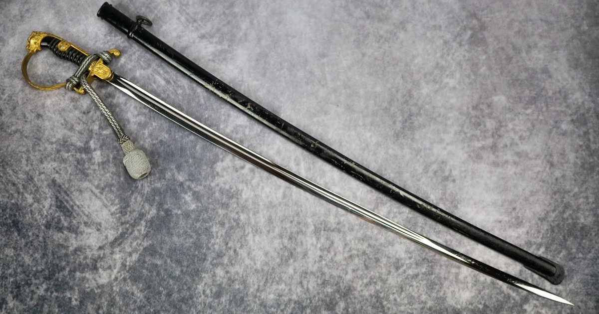 SOLD - Owner Initialed Heer Lion Head Officer Sword
