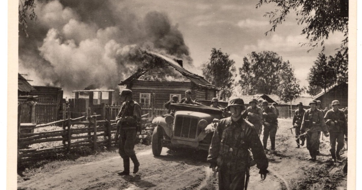 SOLD - SS Men in a Burning Village Postcard
